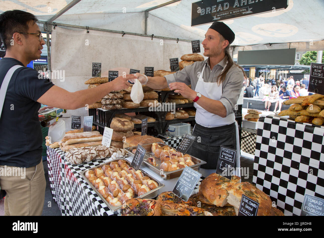 Market traders at King's Cross Real Food Market Stock Photo - Alamy