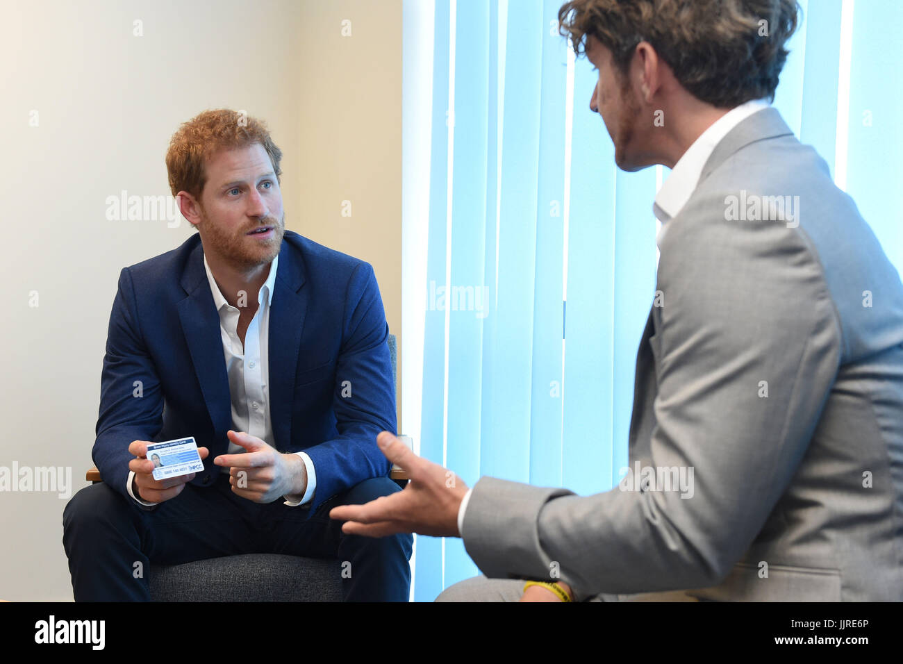 Prince Harry meets brain injury survivor Dominic Hurley during a visit ...