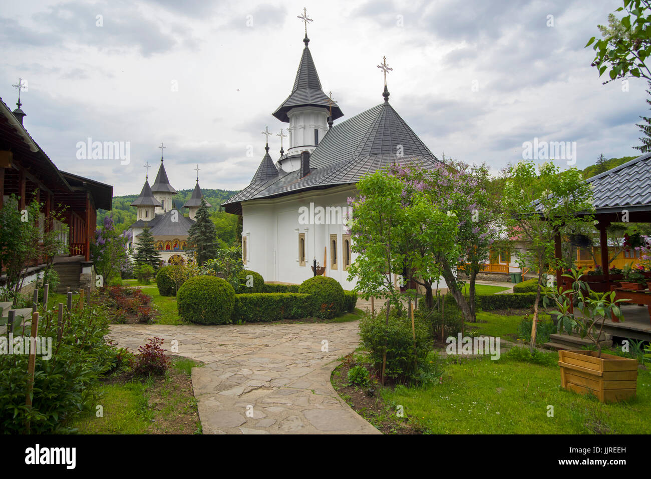 Flower garden of Sihastria monastery in Moldavia Stock Photo - Alamy