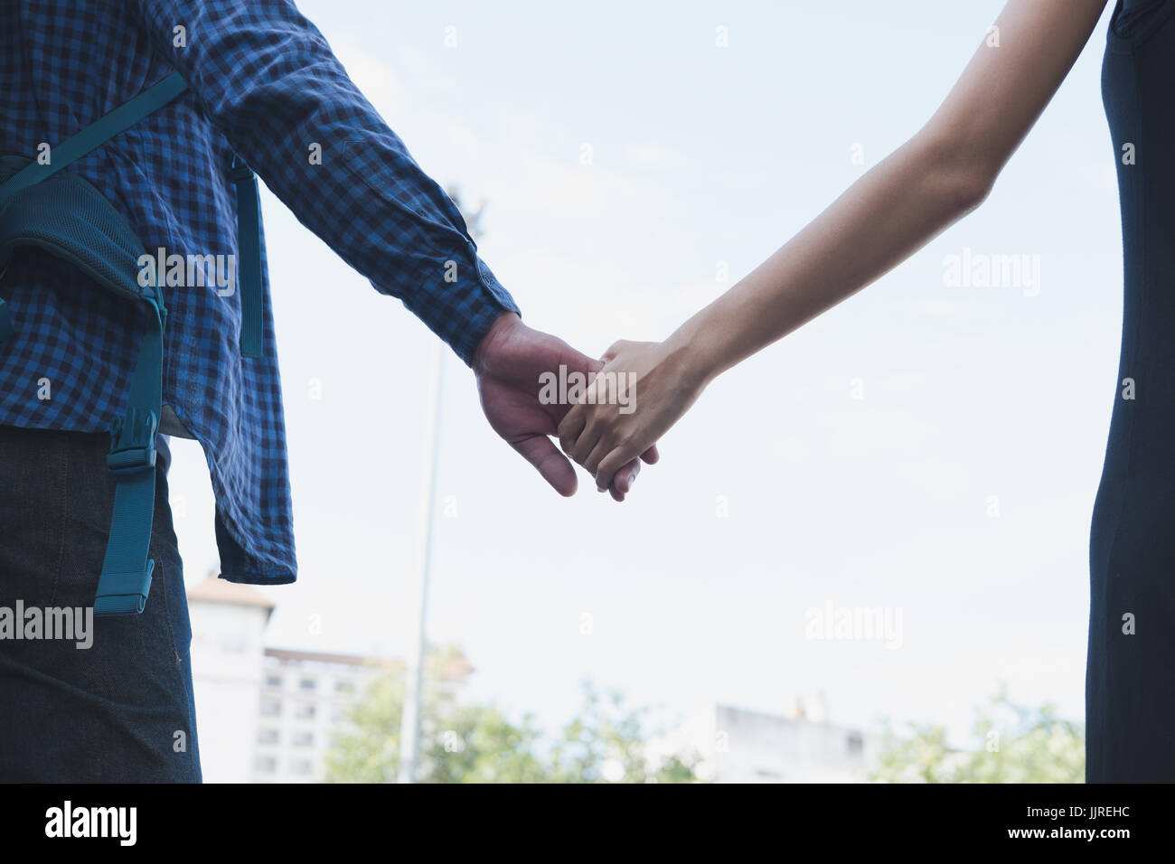 happy young couple holding hand. boyfriend and girlfriend walking ...