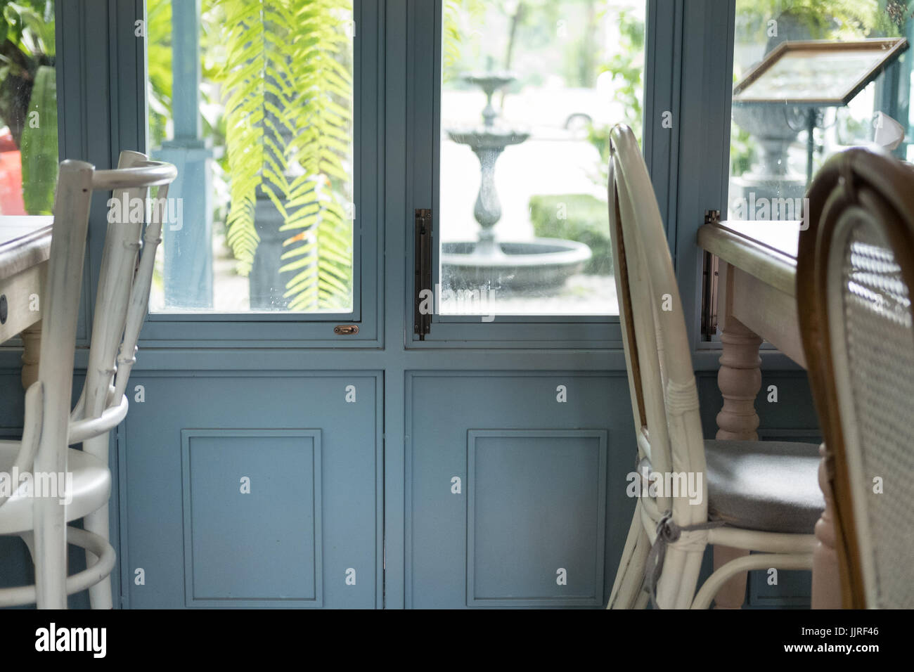 chair in cafe coffee shop beside window with garden view. home interior ...