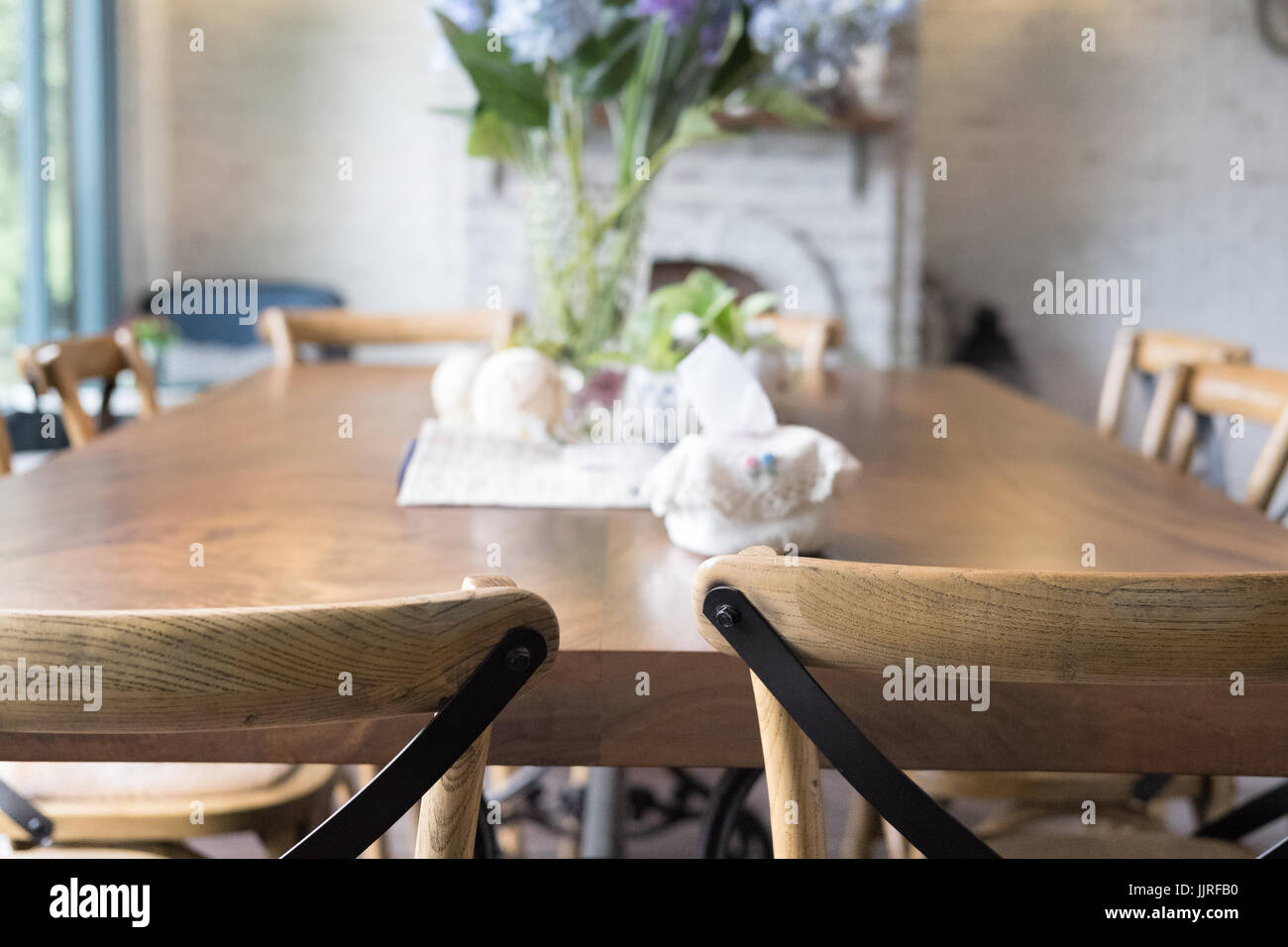 wood table and chair in dining room beside window. modern home interior ...