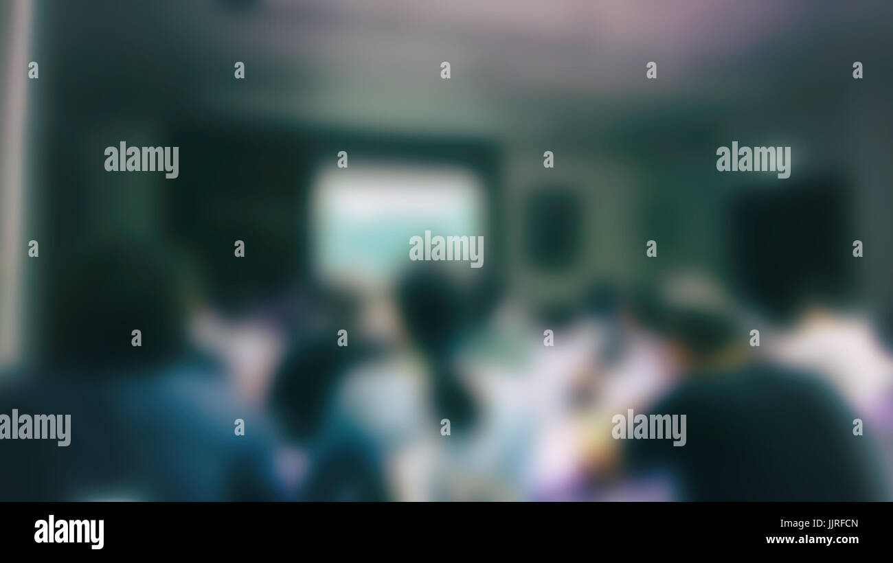 people listen to presentation in conference hall. audience in meeting ...