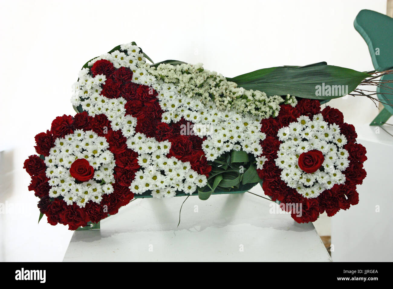 Motorcycle made of flowers, a flower decoration Stock Photo - Alamy