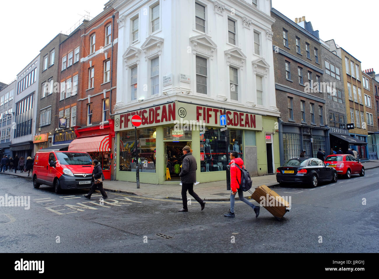 Walking across street hi-res stock photography and images - Alamy