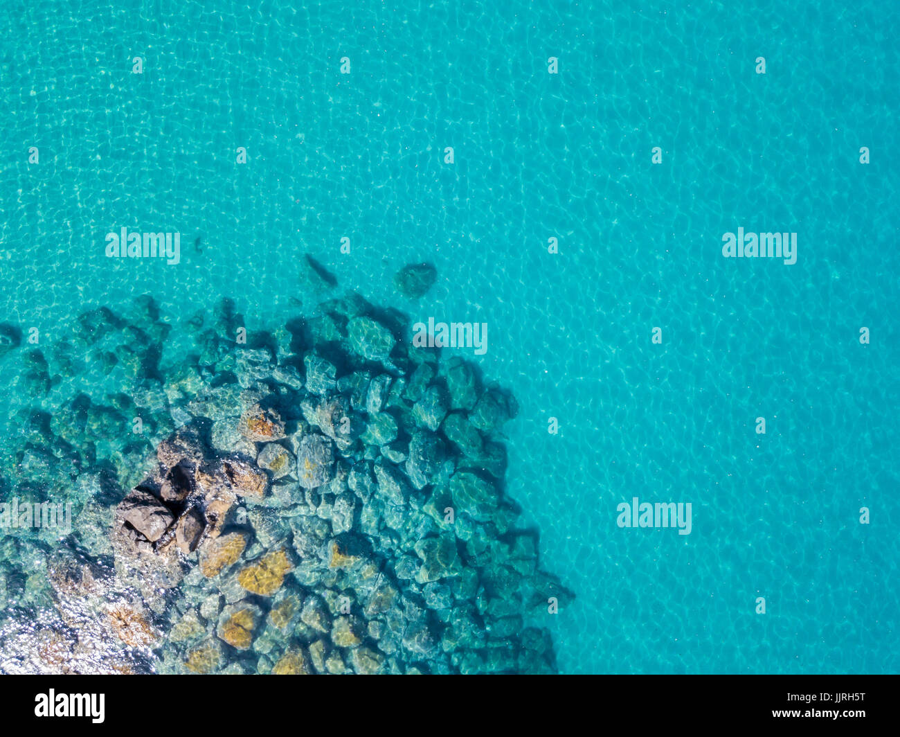 Aerial view of rocks on the sea. Overview of the seabed seen from above ...