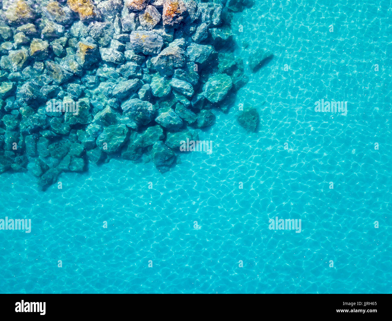 Aerial view of rocks on the sea. Overview of the seabed seen from above ...