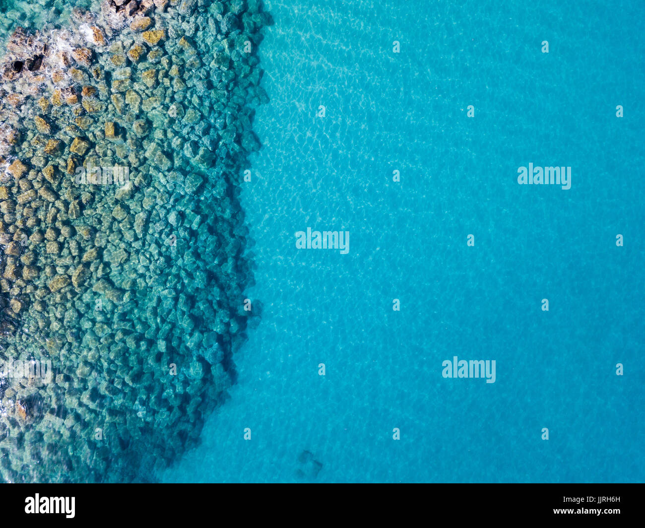 Aerial view of rocks on the sea. Overview of the seabed seen from above ...