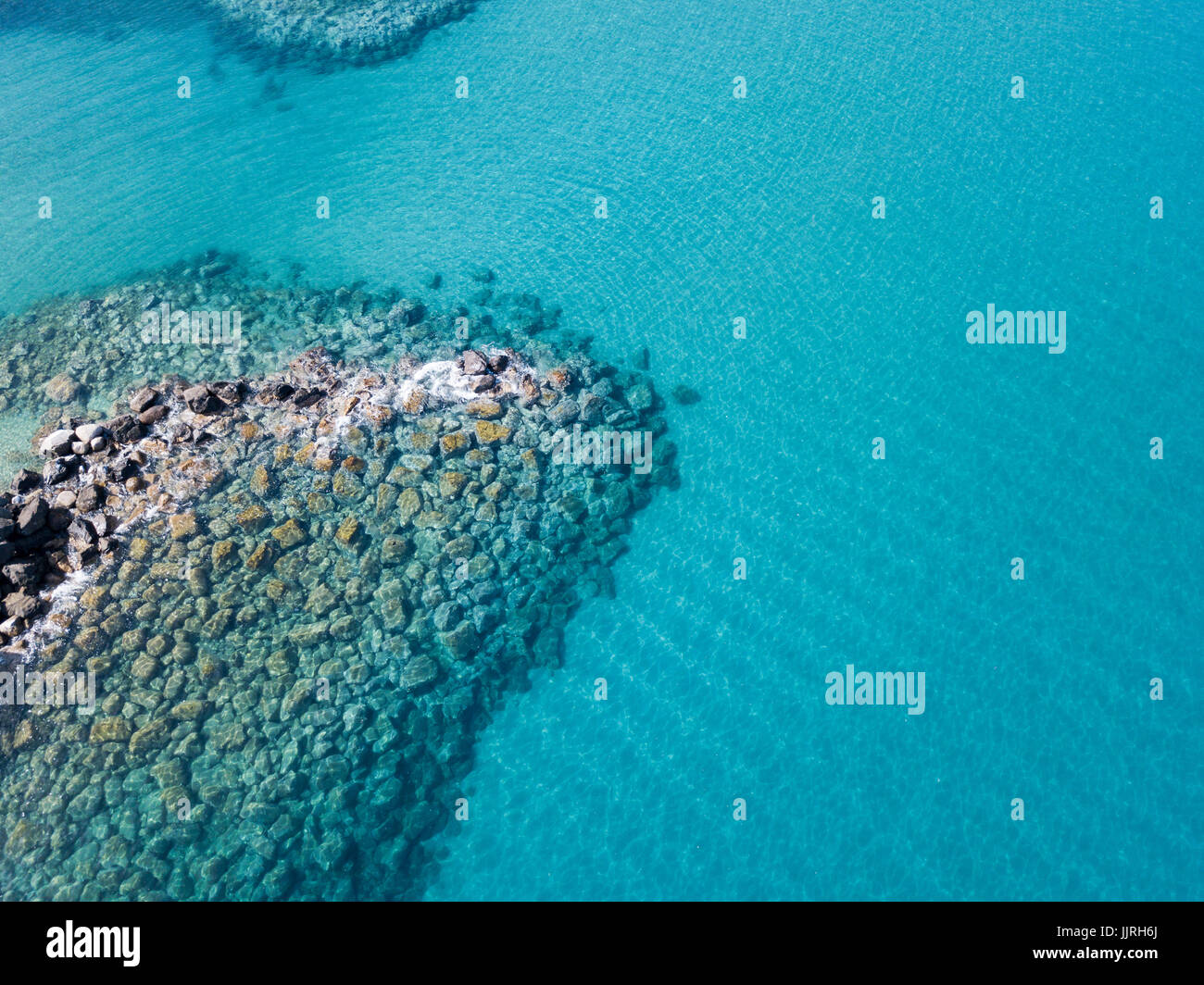 Aerial view of rocks on the sea. Overview of the seabed seen from above ...