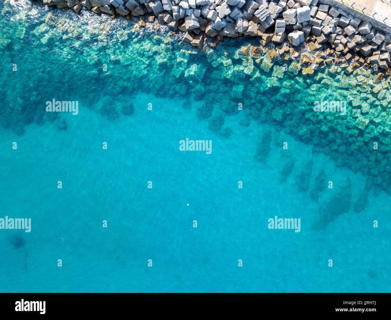 Aerial view of rocks on the sea. Overview of the seabed seen from above ...
