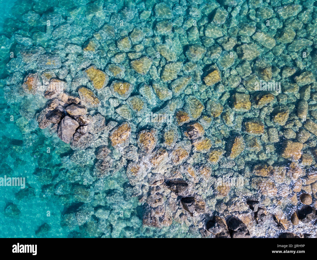 Aerial view of rocks on the sea. Overview of the seabed seen from above ...