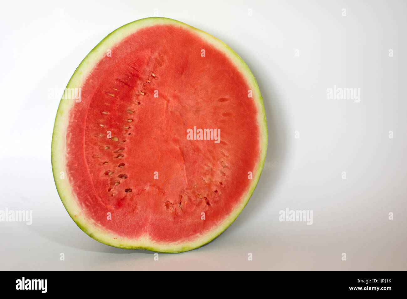 Sliced juicy red watermelon Stock Photo - Alamy