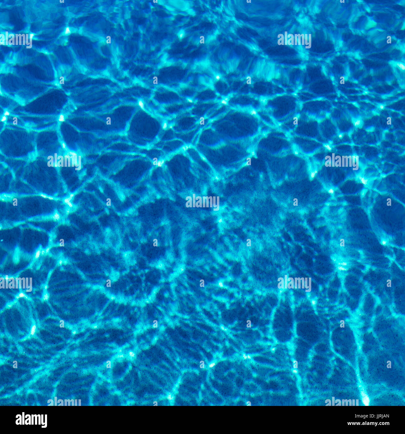 Water in swimming pool with sun reflection. Blue water. Water abstract ...