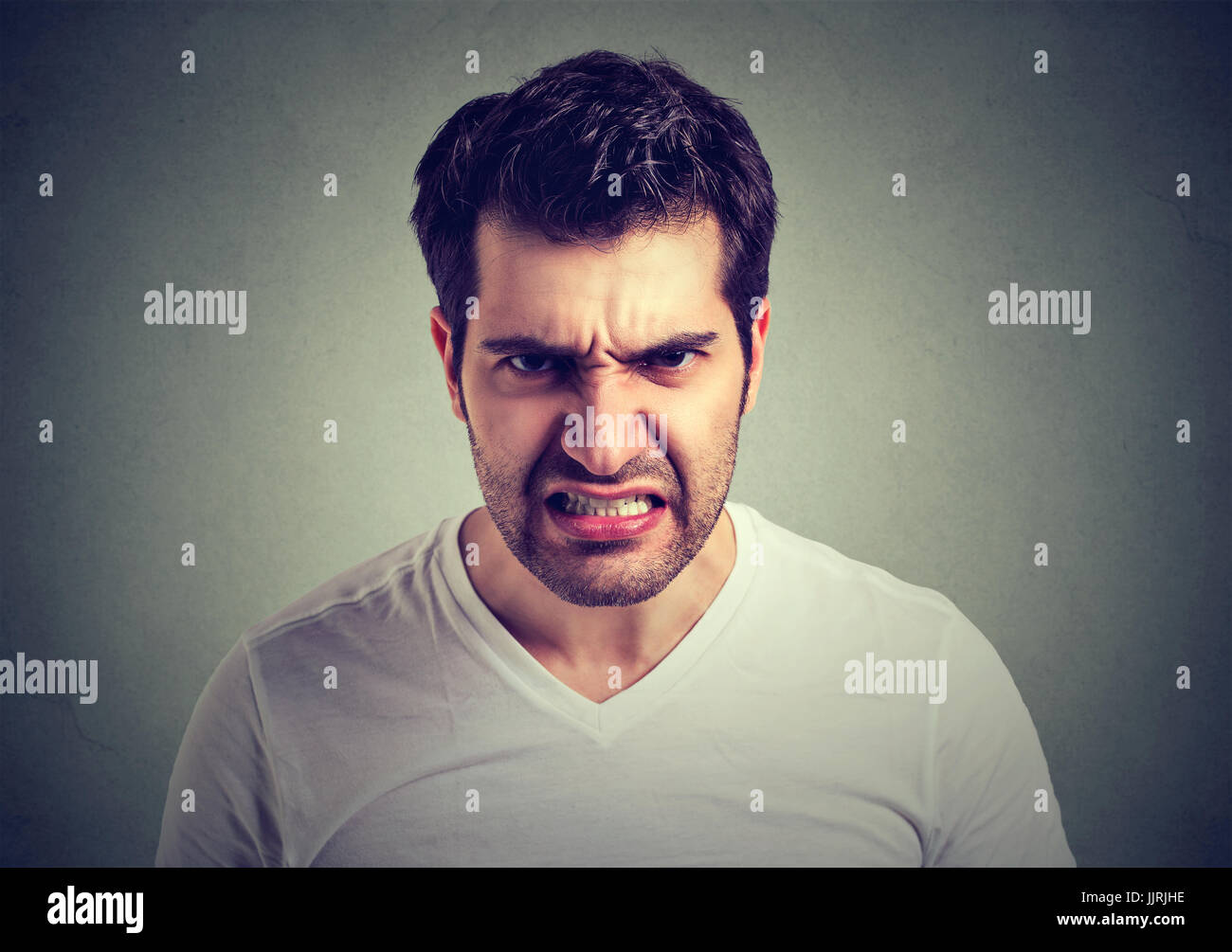 portrait of young angry man Stock Photo - Alamy