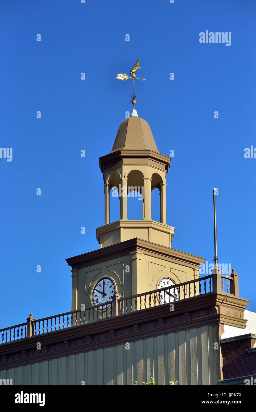 An unusual decorative roof line complete with a weather vane atop a ...