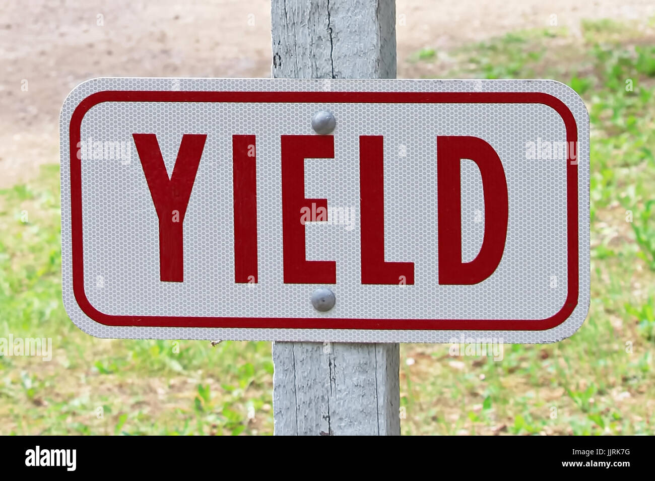 A rectangular yield word sign Stock Photo - Alamy