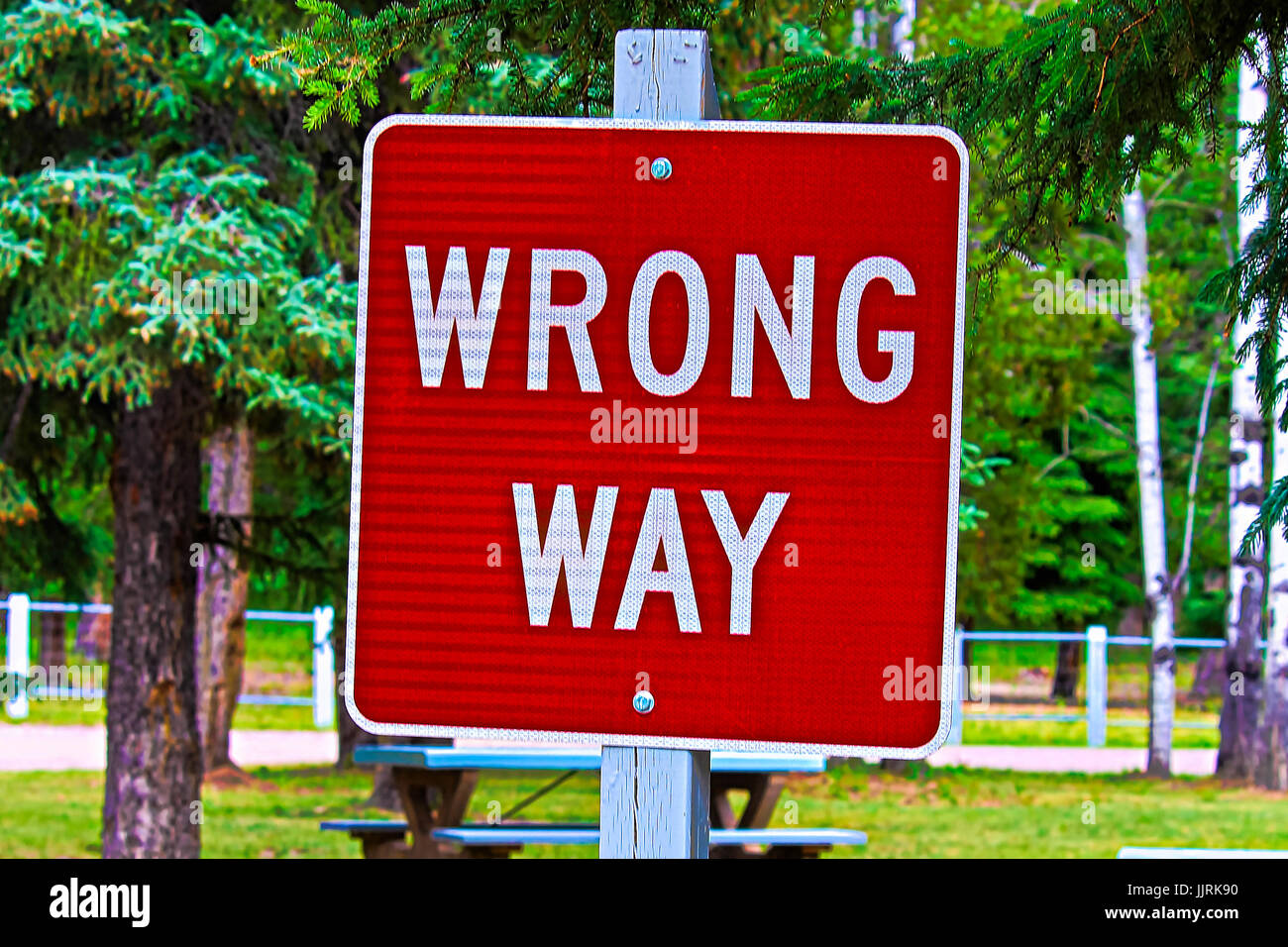 Closeup of a wrong way sign Stock Photo - Alamy