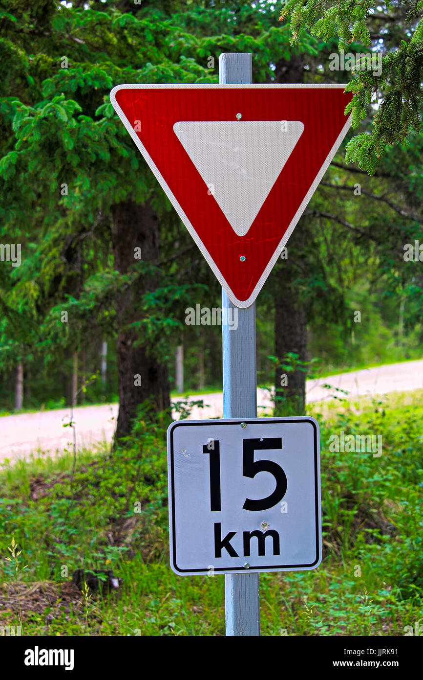 A yield with a maximum 15 km sign below it Stock Photo - Alamy