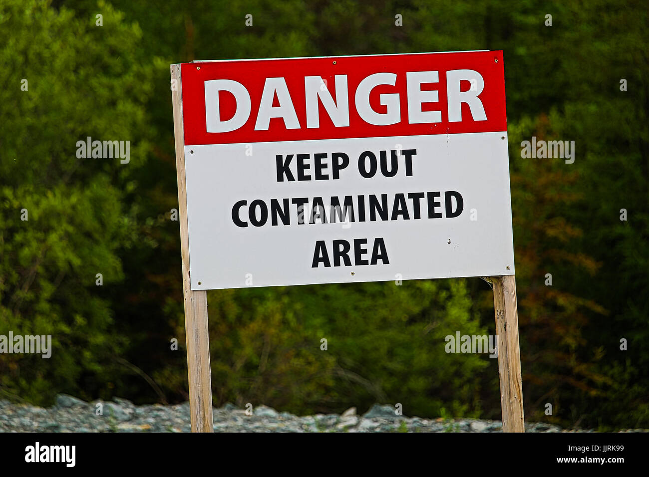 Closeup of a danger keep out of contaminated area sign Stock Photo - Alamy