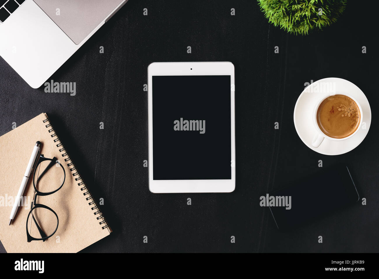 digital tablet blank screen on work desk top view Stock Photo - Alamy