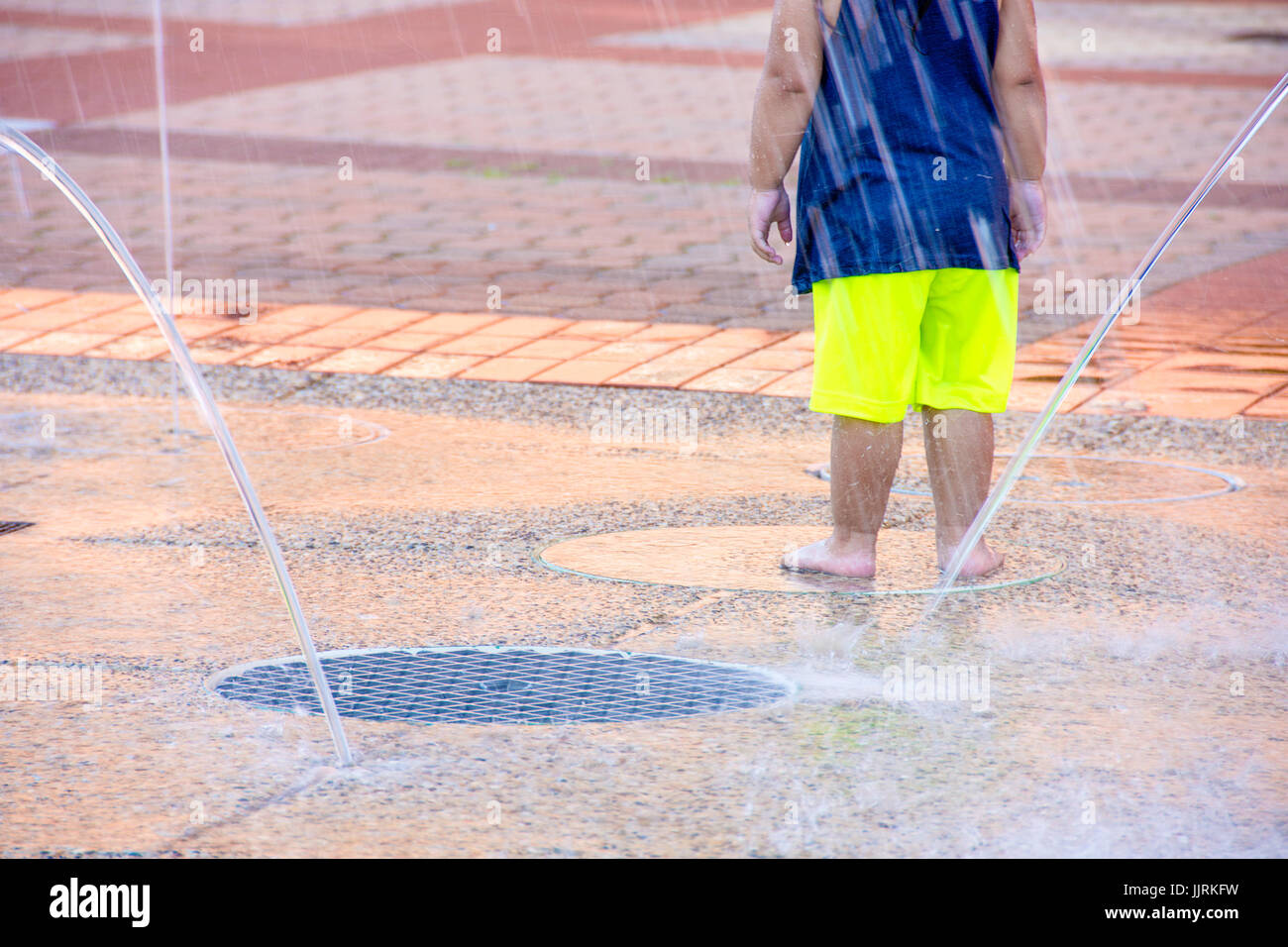 Girl water park splash pad hi-res stock photography and images - Alamy