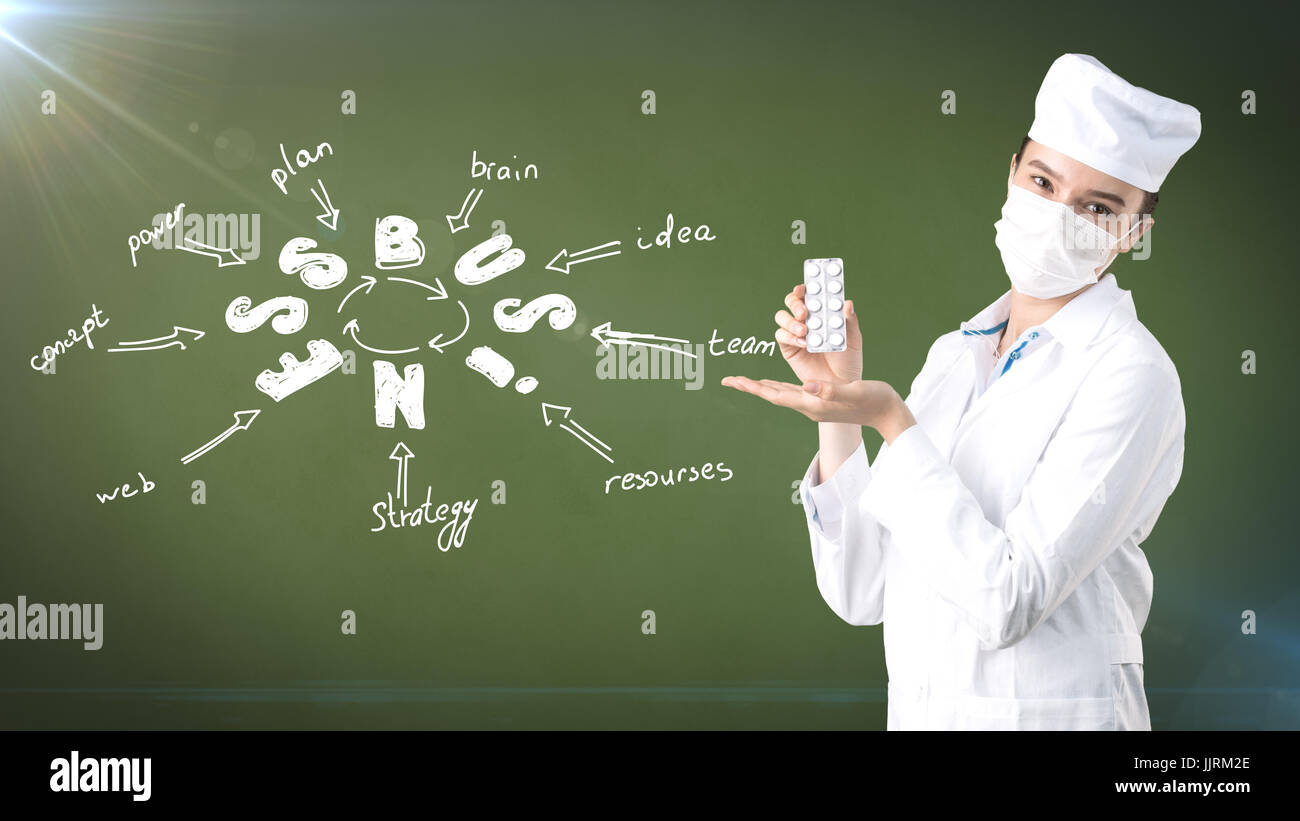 Beautiful medical woman doctor in uniform. Studio painted background ...