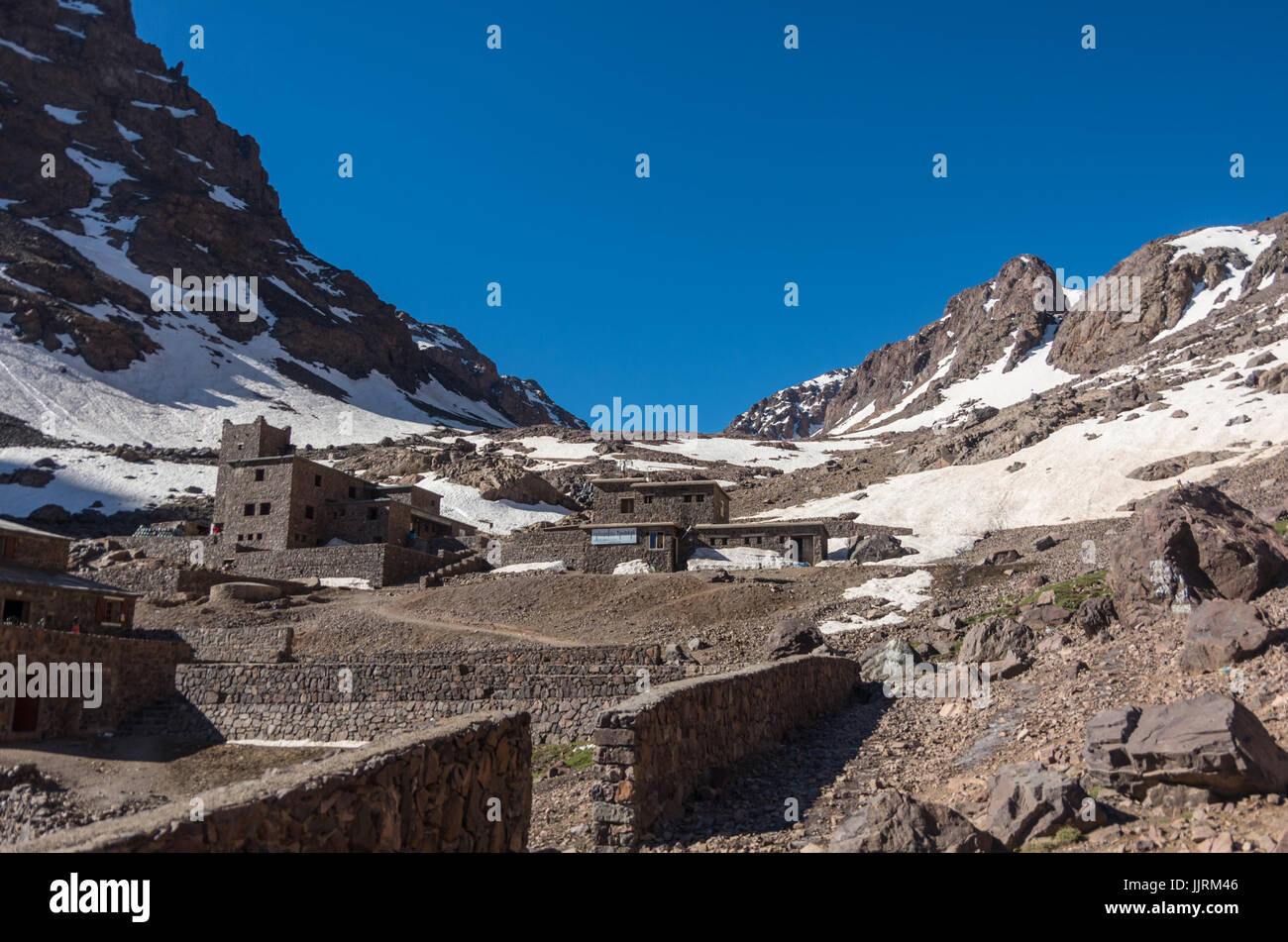 Toubkal national park in springtime with mount, cover by snow and ice ...