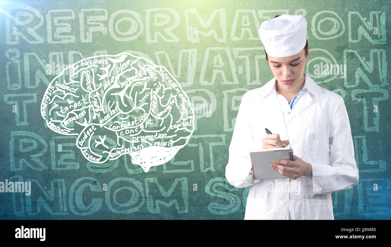 Beautiful medical woman doctor in uniform. Studio painted background ...