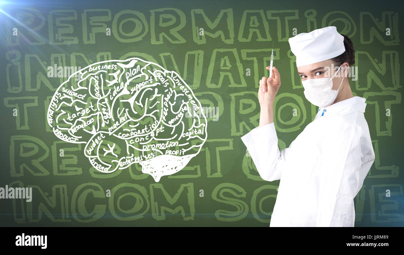 Beautiful medical woman doctor in uniform. Studio painted background ...