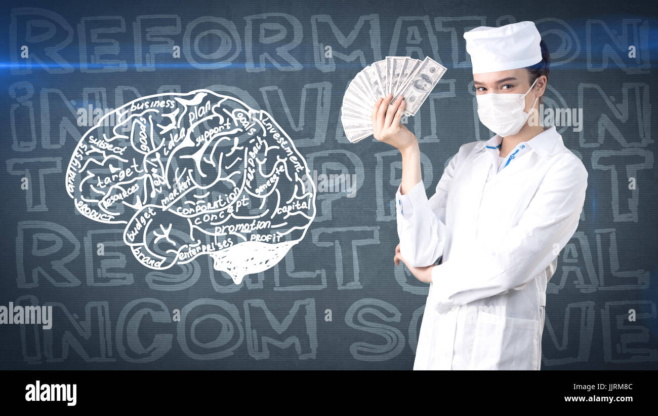 Beautiful medical woman doctor in uniform. Studio painted background ...