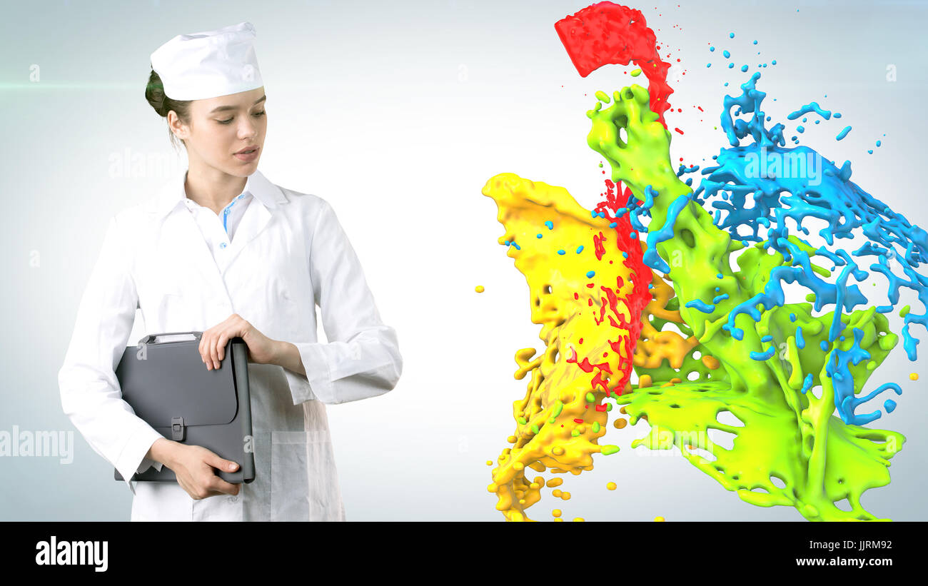 Beautiful medical woman doctor in uniform. Studio painted background ...