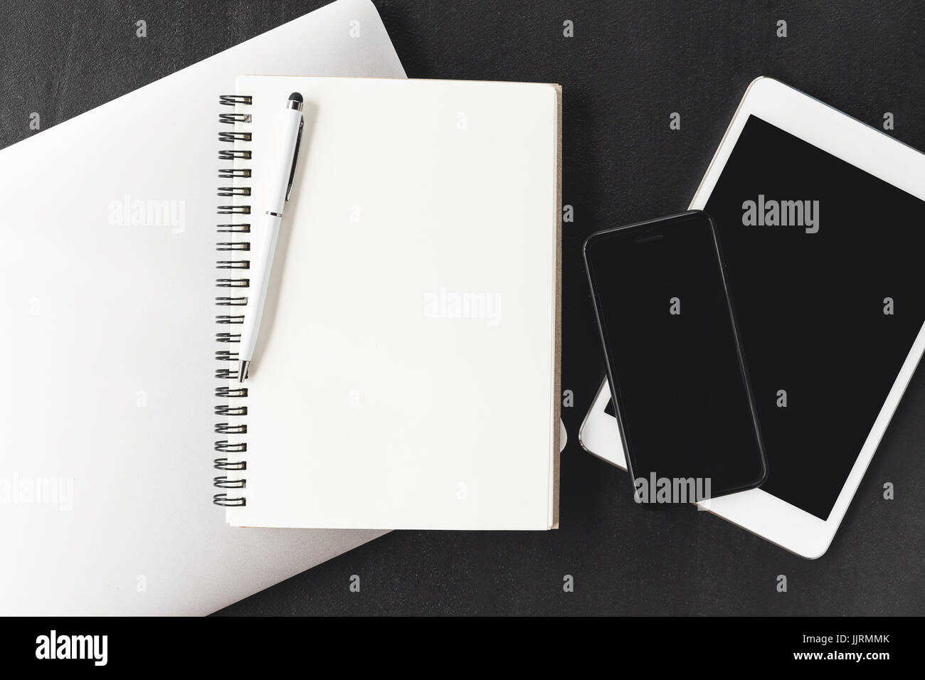 notebook blank page stack on laptop computer Stock Photo - Alamy