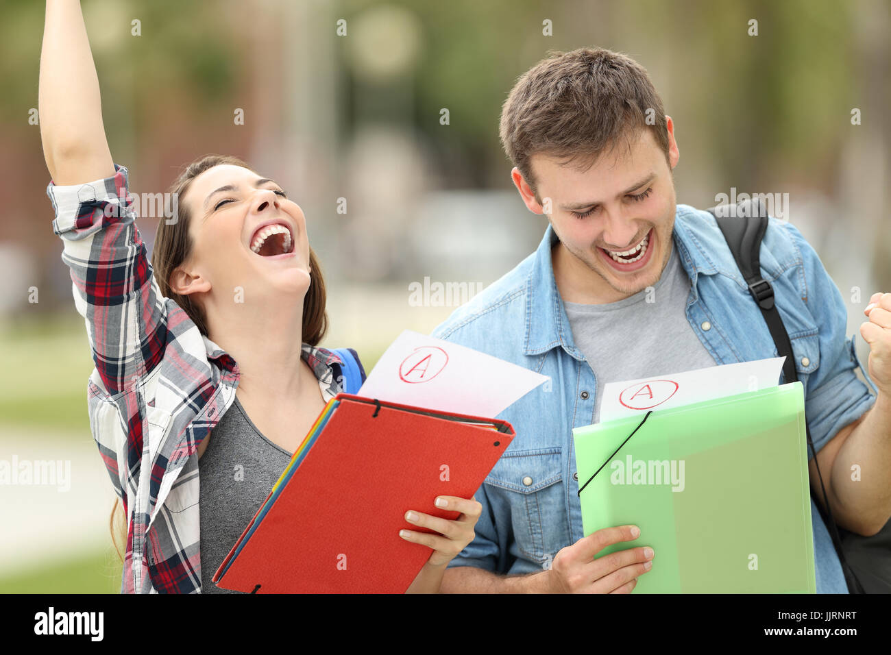 Students celebrating exam success hi-res stock photography and images ...