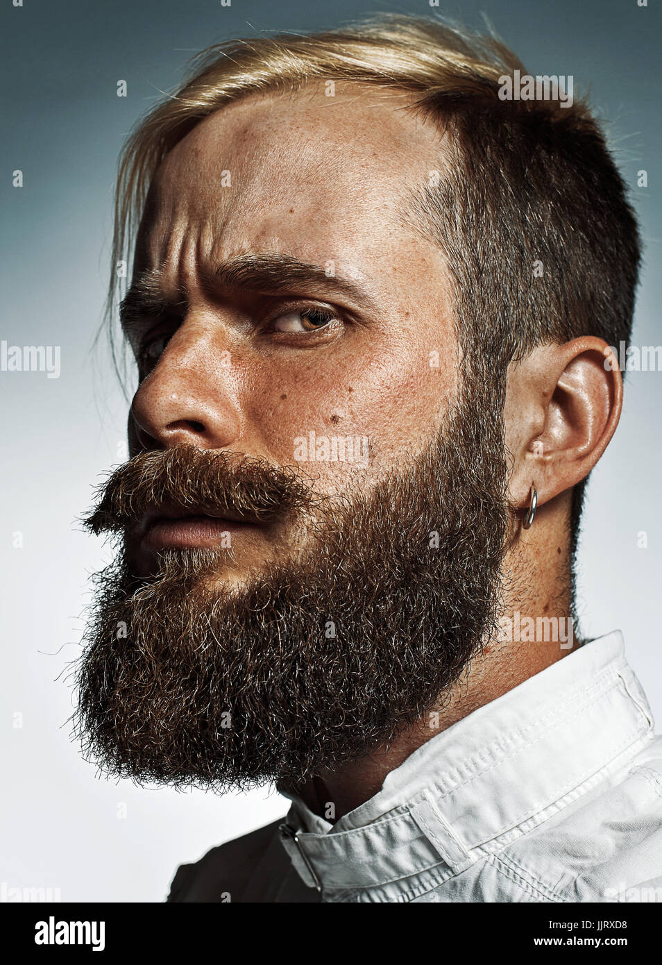 Portrait of hipster bearded man's side face Stock Photo - Alamy