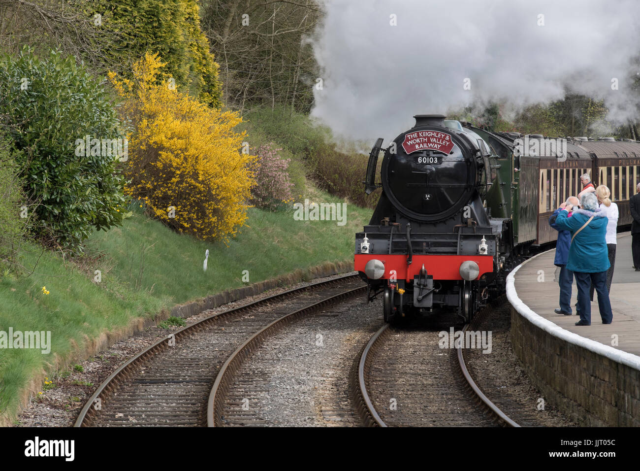 Train slowly coming station hi-res stock photography and images - Alamy