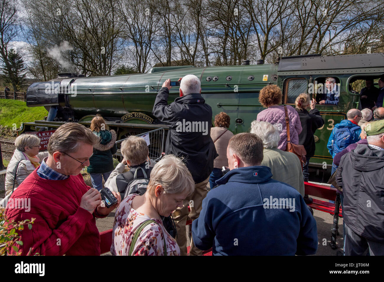 Crowd of people view iconic steam locomotive engine, LNER Class A3 ...