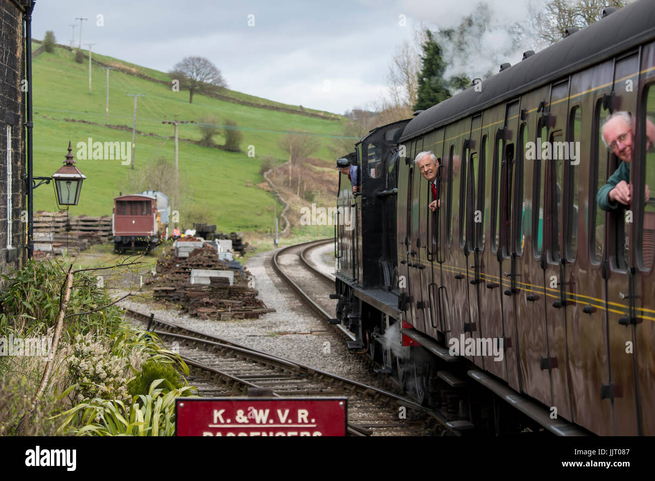 Steam train pulling passenger coaches hi-res stock photography and ...