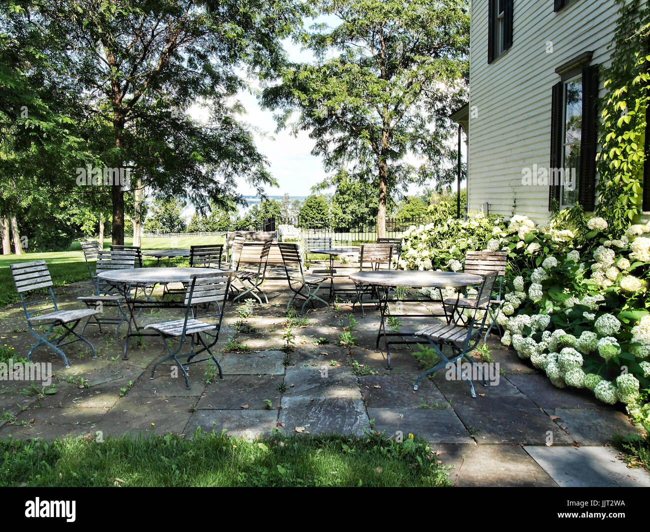 pretty old fashioned oudoor patio Stock Photo - Alamy