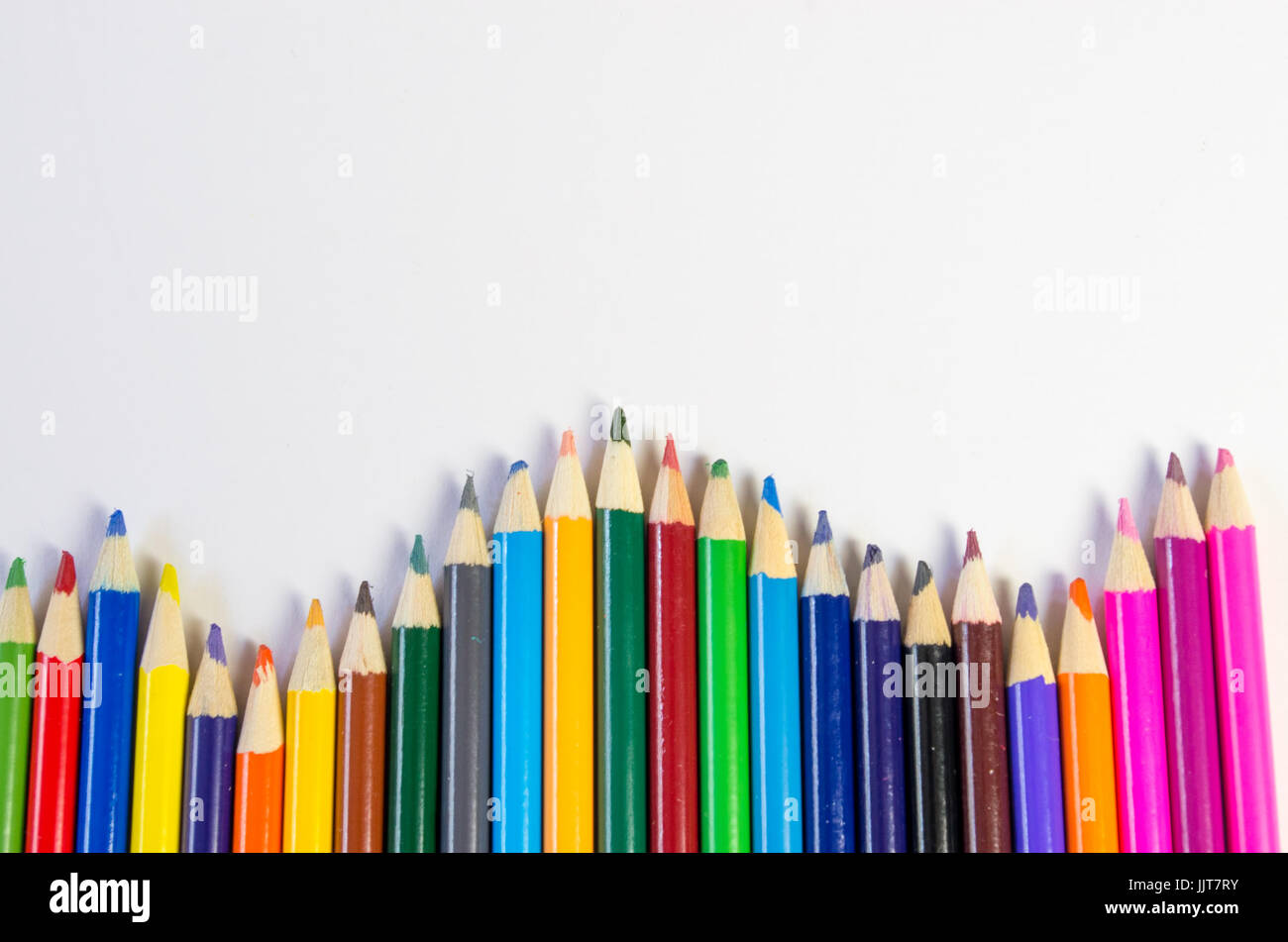 Colored pencil border on white background Stock Photo - Alamy