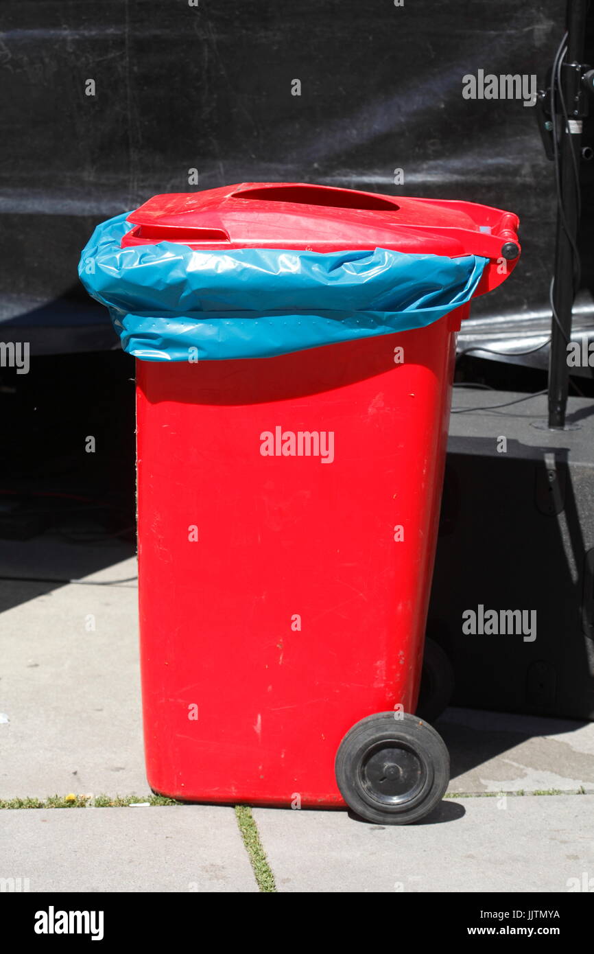red public garbace can, waste bin Stock Photo - Alamy