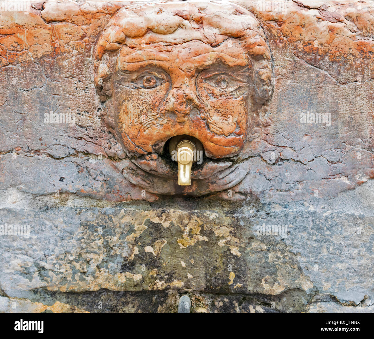 VERONA ITALY A SCULPTURED MEDIEVAL HEAD USED AS A WATER SPOUT Stock ...