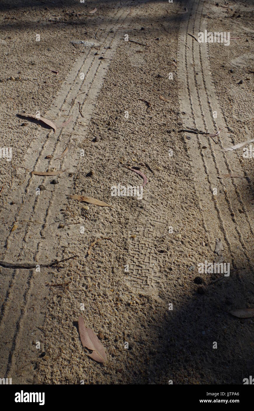 Tire marks on unpaved road. Adventure and motorsports Stock Photo - Alamy