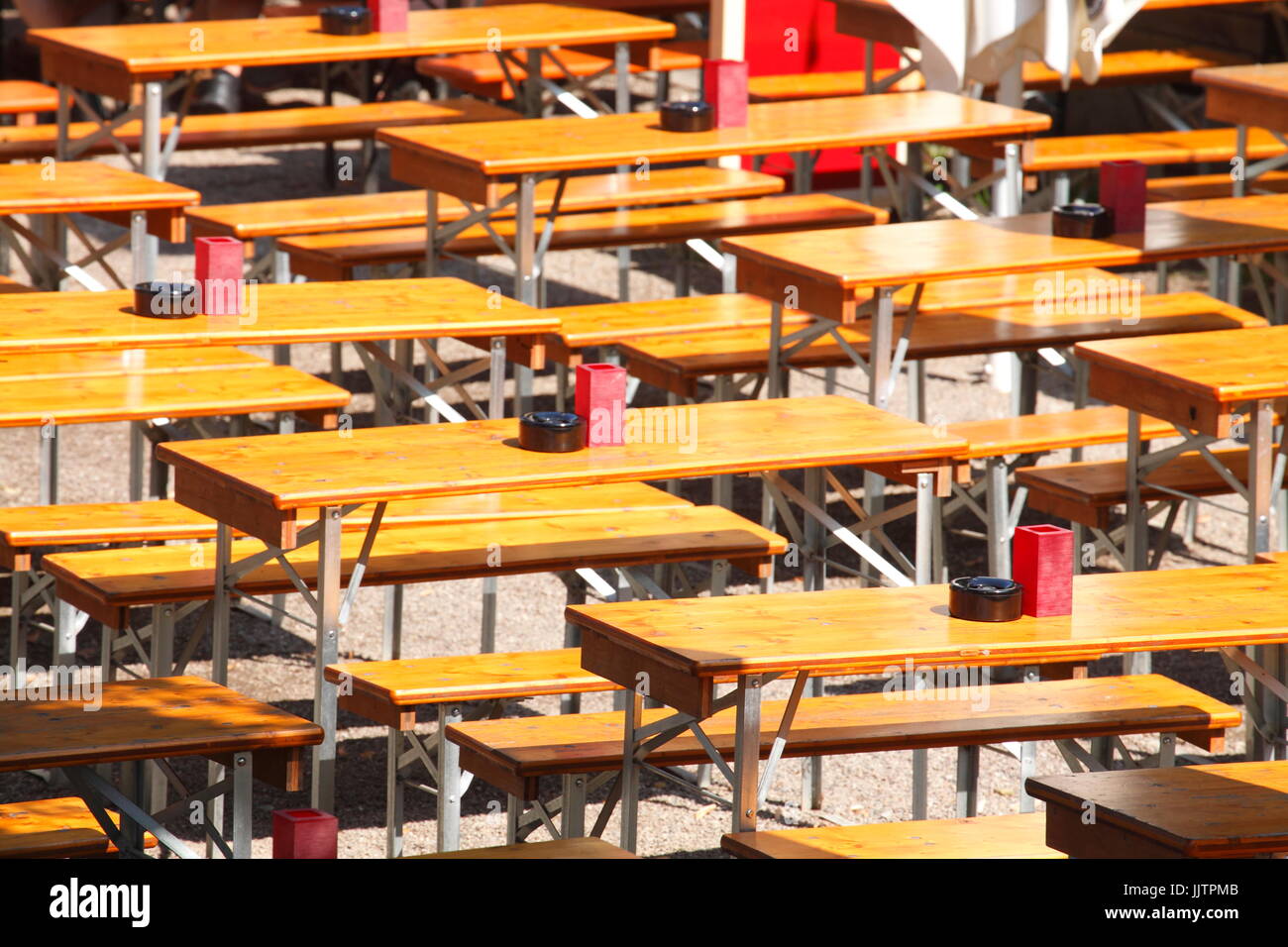 wooden folding tables and benches Stock Photo - Alamy