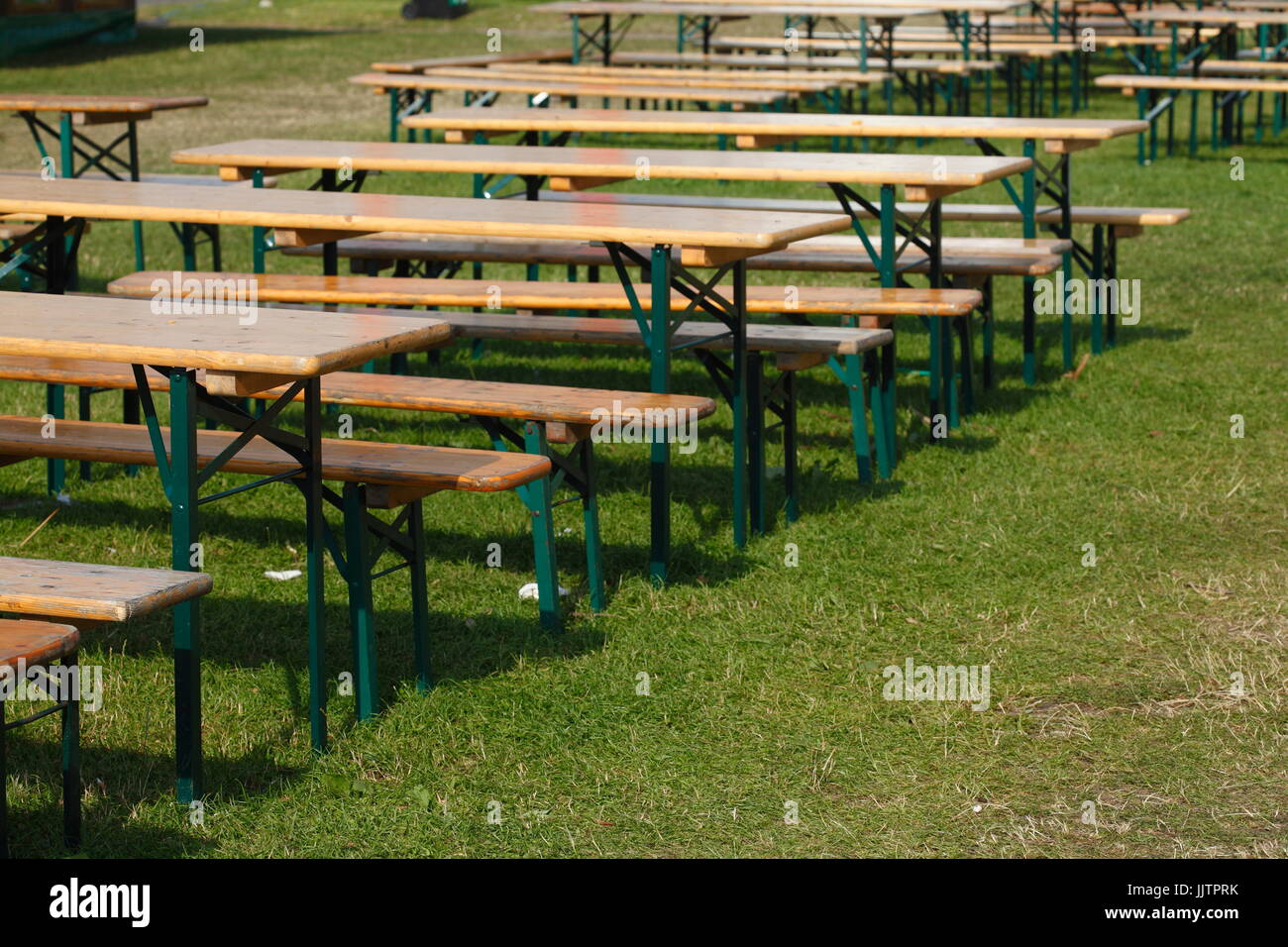 wooden folding tables and benches Stock Photo - Alamy