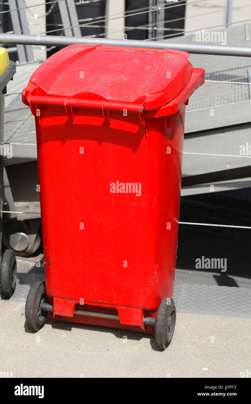 red Recycling Bin for glass Stock Photo - Alamy