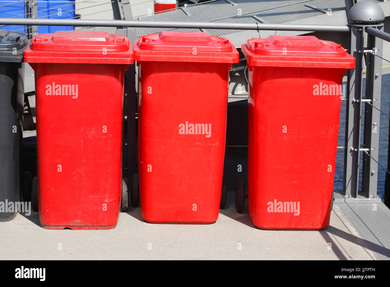 red Recycling Bin for glass Stock Photo - Alamy