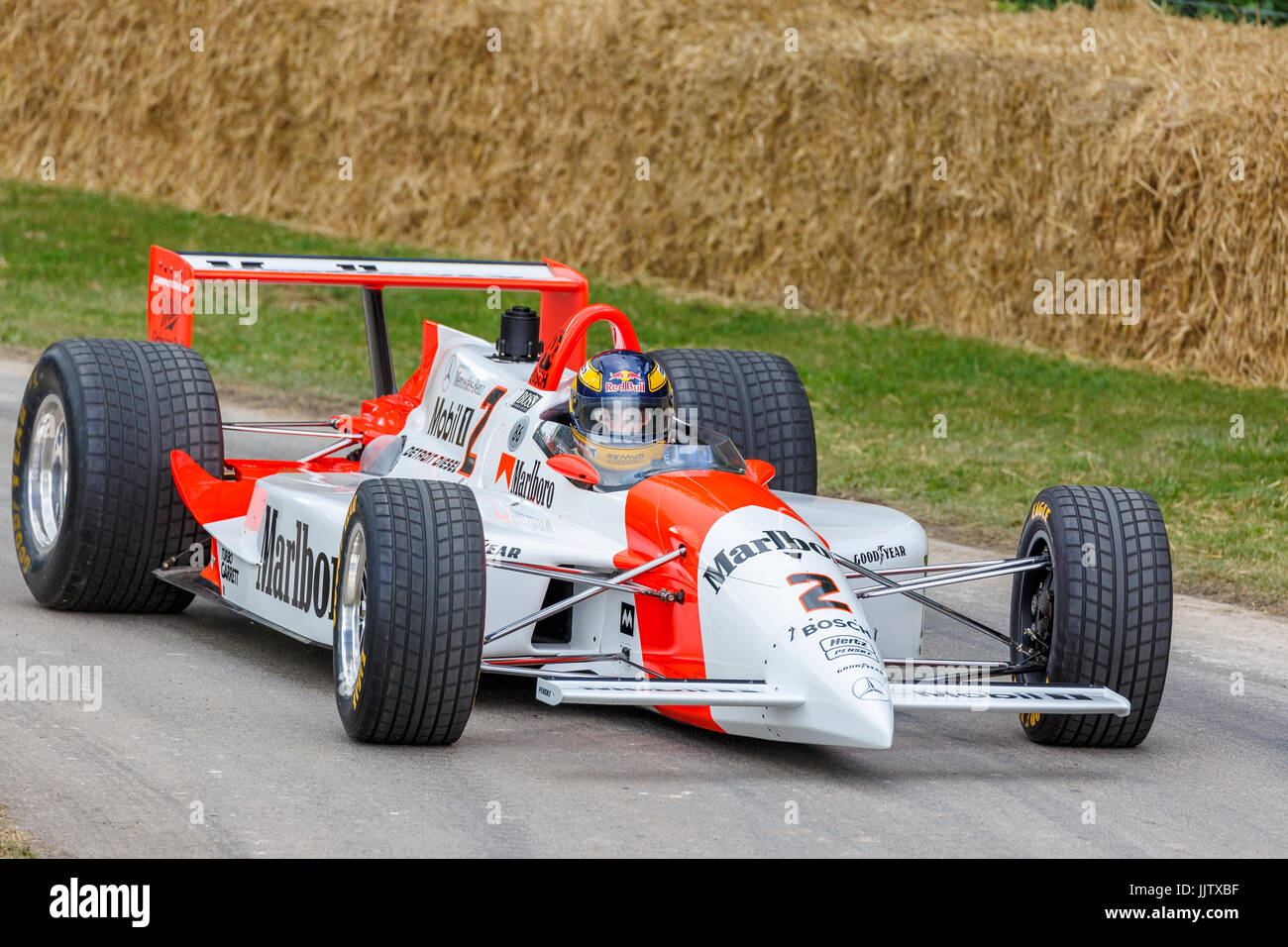 1994 Penske-Mercedes PC23 CART racer with driver Karl Wandlinger at the ...