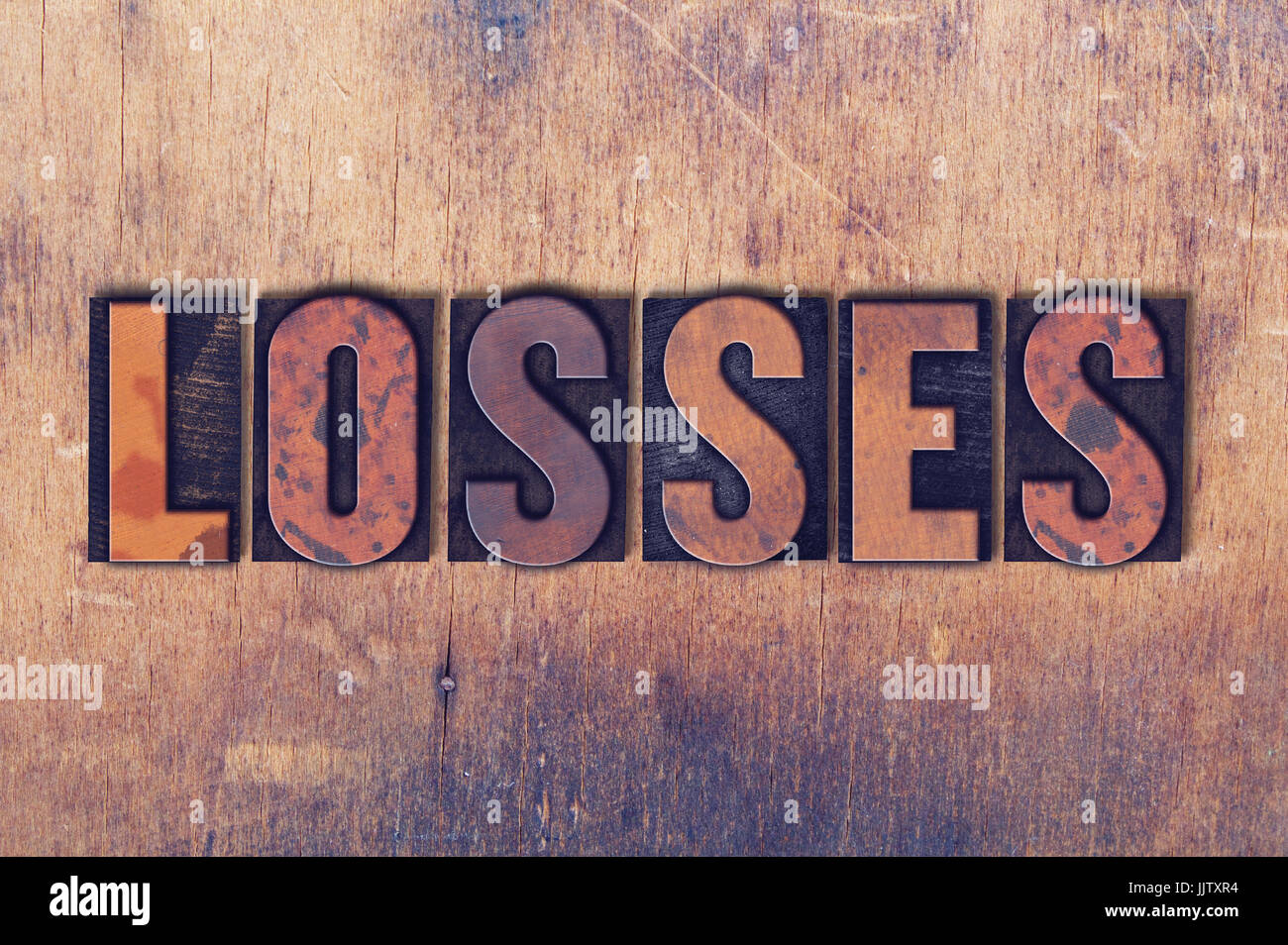 The word Losses concept and theme written in vintage wooden letterpress ...