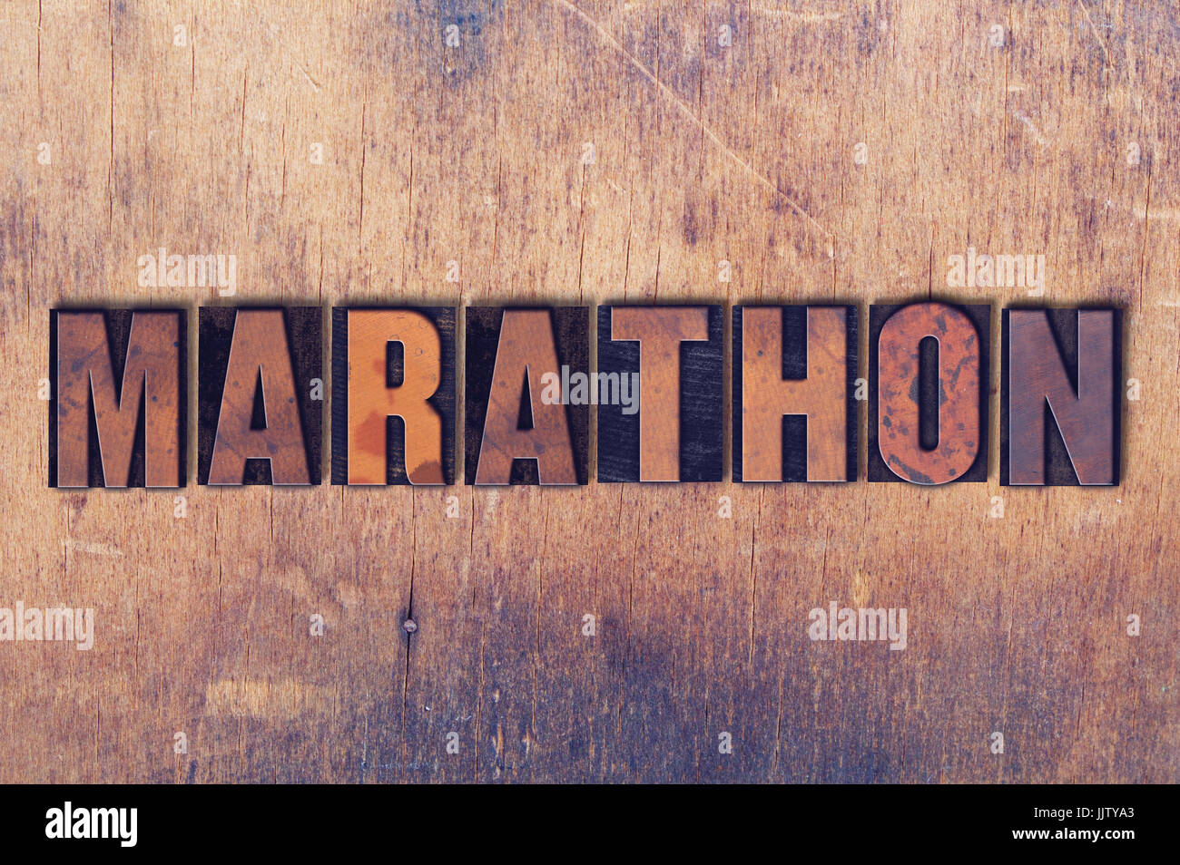 The word Marathon concept and theme written in vintage wooden ...
