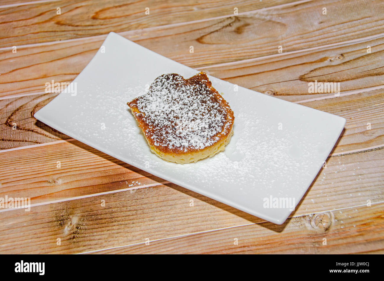 Homemade Creme brulee with powder sugar, burnt cream, crema catalana ...